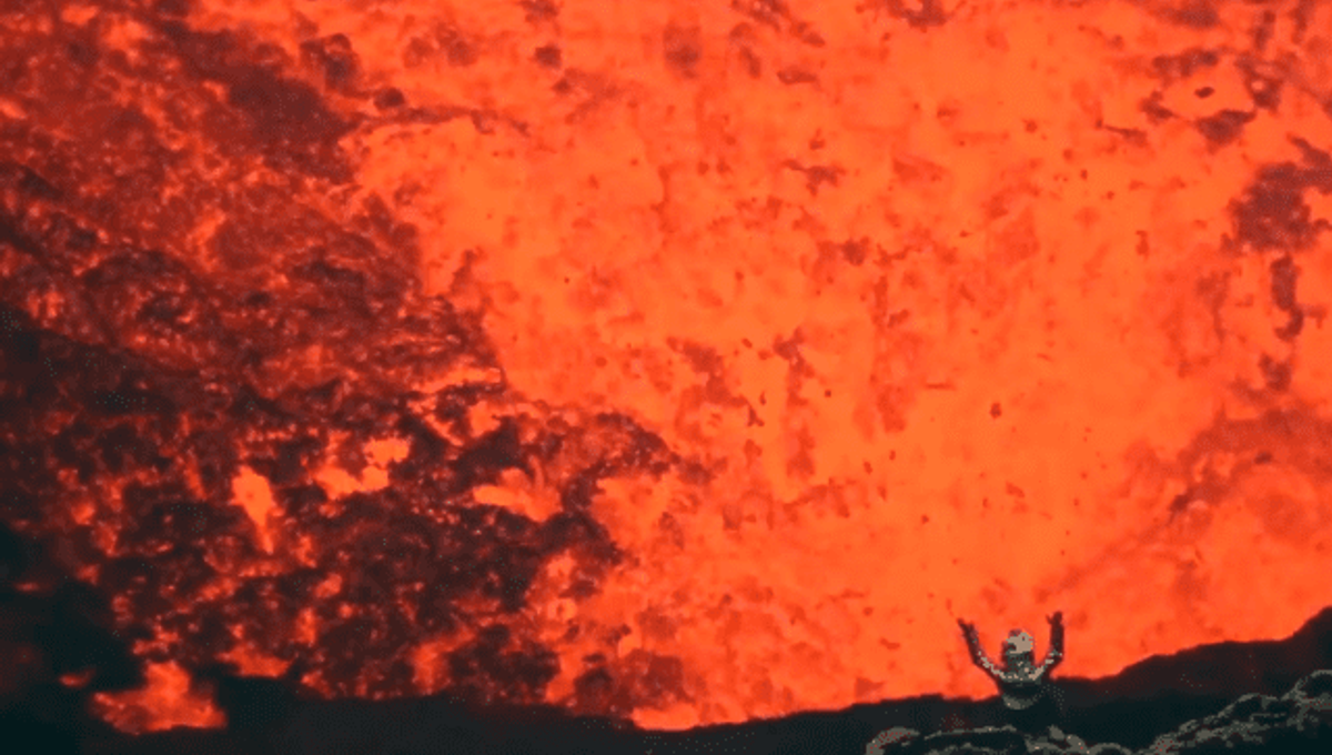 Watch A Man Climb Into An Active Volcano | IFLScience