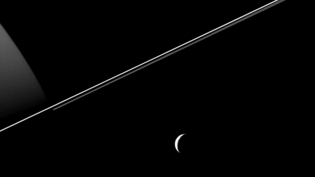 The Rings Of Saturn And Tethys Captured In Stunning Image | IFLScience