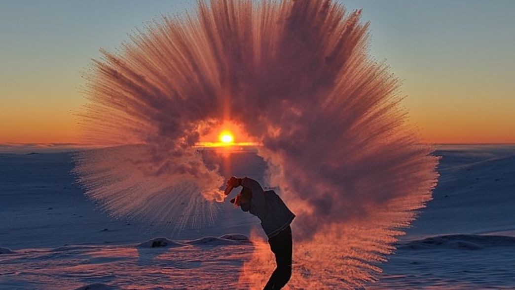 Hot Tea Freezing In Mid-Air Captured In Stunning Photograph | IFLScience