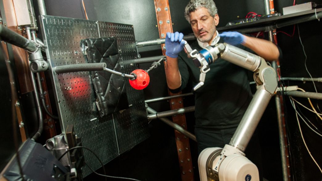 Amputee Monkeys Control Robotic Arm With Their Minds | IFLScience