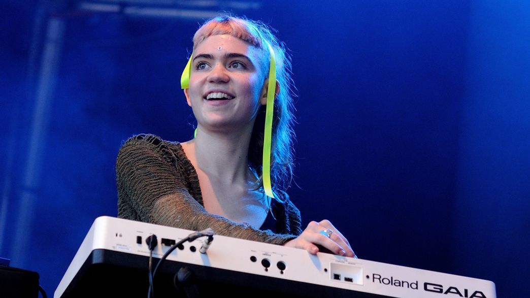 Grimes Says Her Health Regime Includes "Astro-Gliding" And Removing The ...