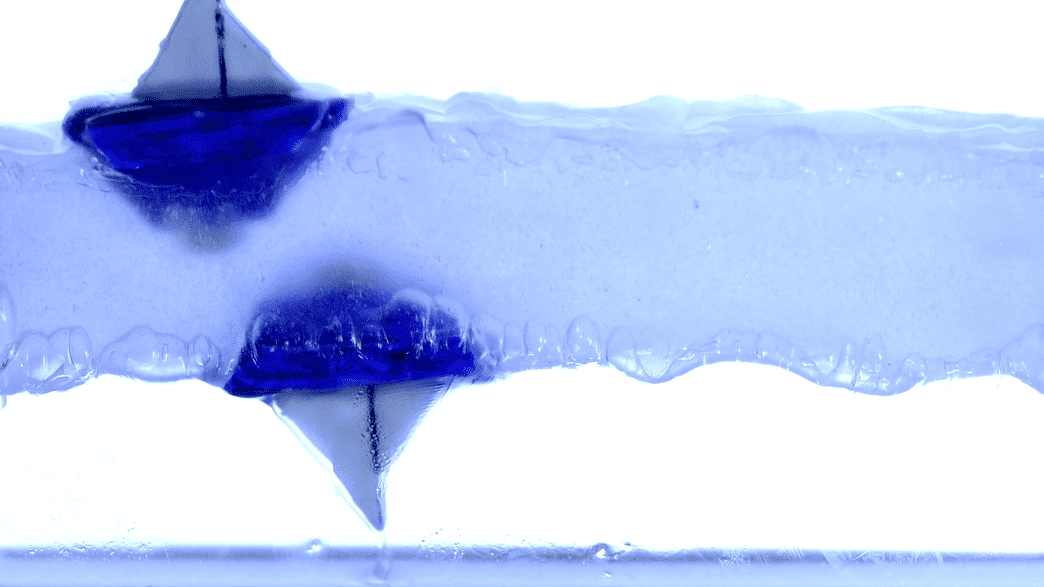 In Levitating Liquids, Boats Also Float Upside Down | IFLScience