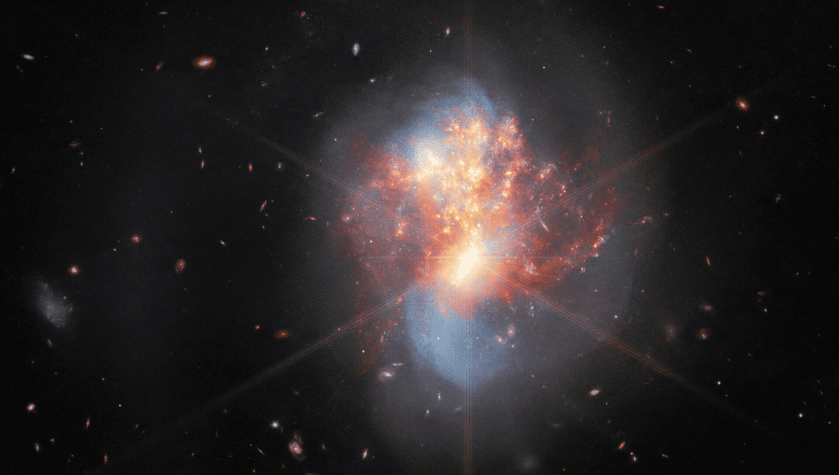 JWST Views Galaxy Collision Causing Spectacular Burst Of Star Formation ...