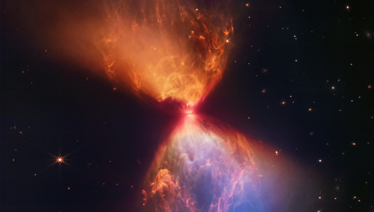 Protostar Caught In Fiery Hourglass By JWST | IFLScience