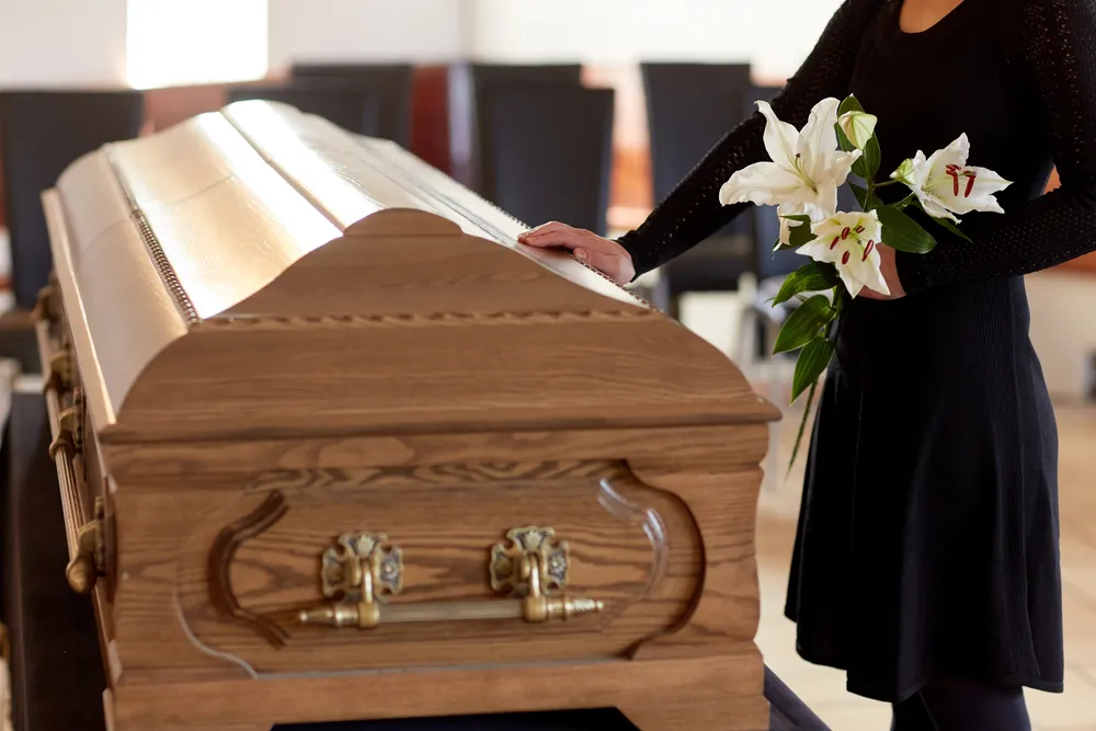 Funeral Caskets With Person