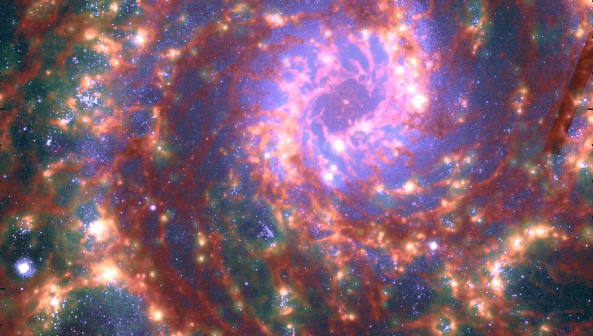 JWST Snaps Galaxy Positively Popping With Superbubbles | IFLScience