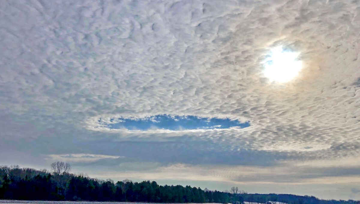 Fallstreak Holes Look Like Giant “Portals” To Another Dimension ...